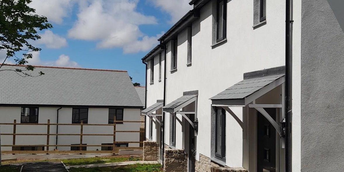 All 28 new homes occupied at a 100% affordable housing development in ...